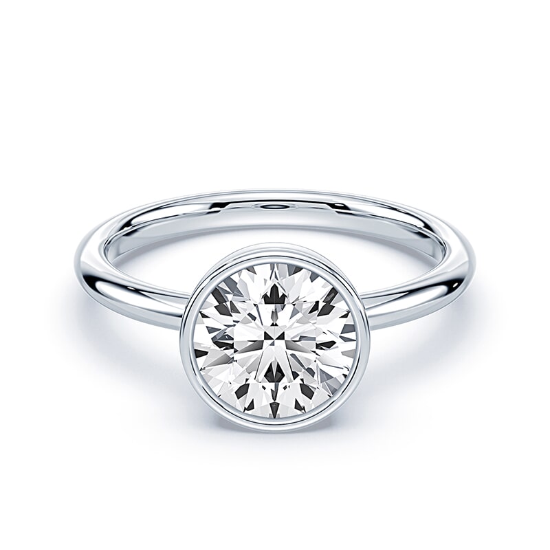 Round Cut Bezel Platinum Diamond Ring | Plum Diamonds